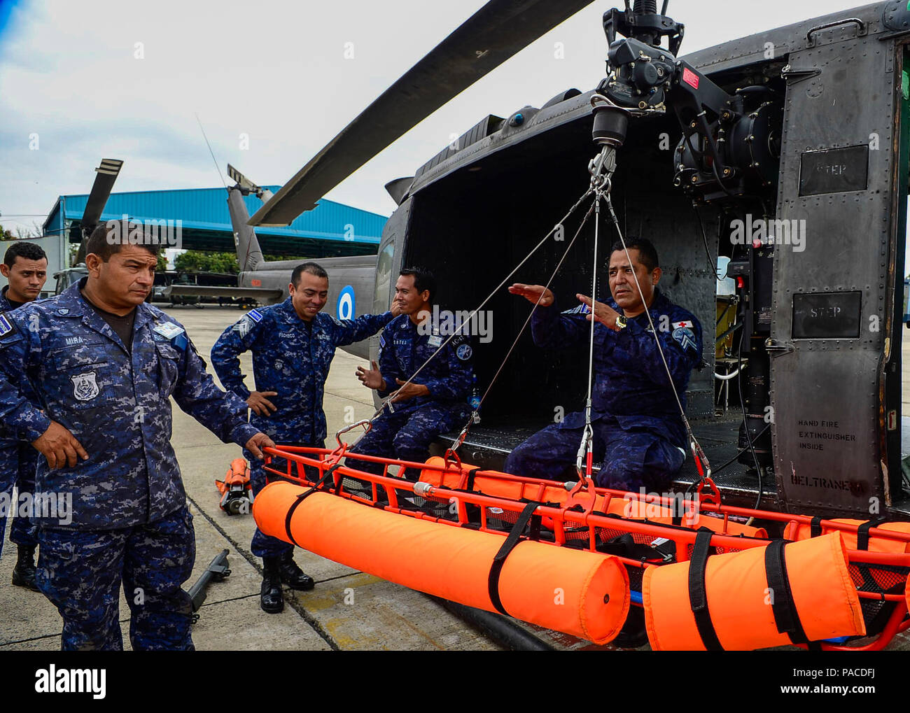 Members from the Salvadoran air demonstrate the use of and extractor ...