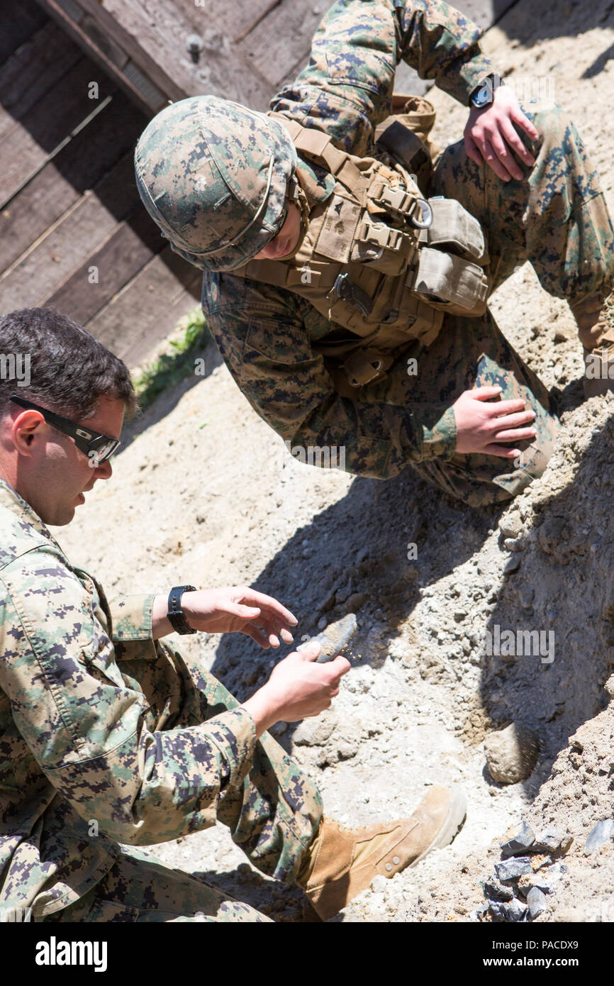 U.S. Marine Corps Staff Sgt. Jorge L. Rivero, (left), Explosive ...
