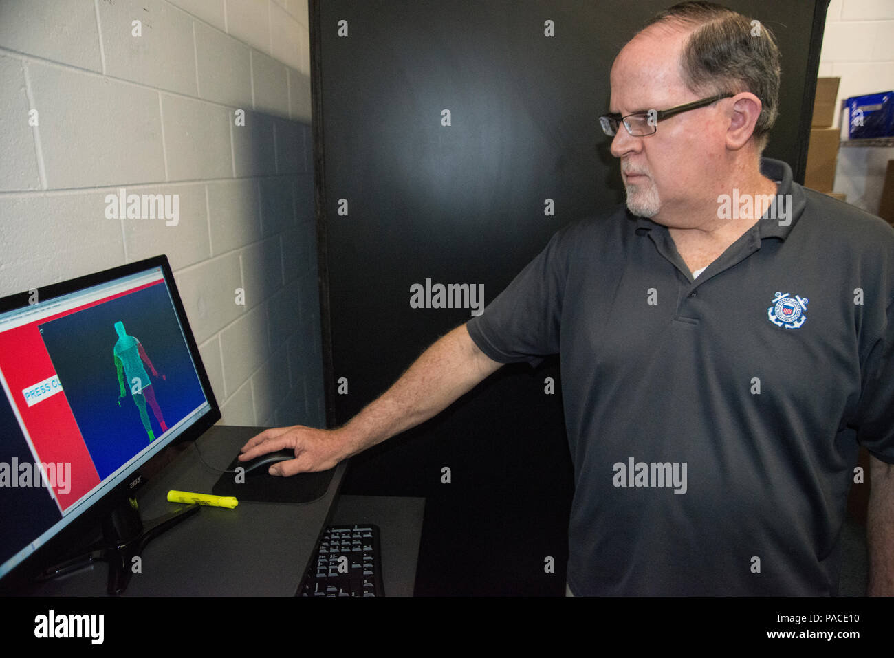 John Brown, an employee at the Uniform Distribution Center onboard the ...