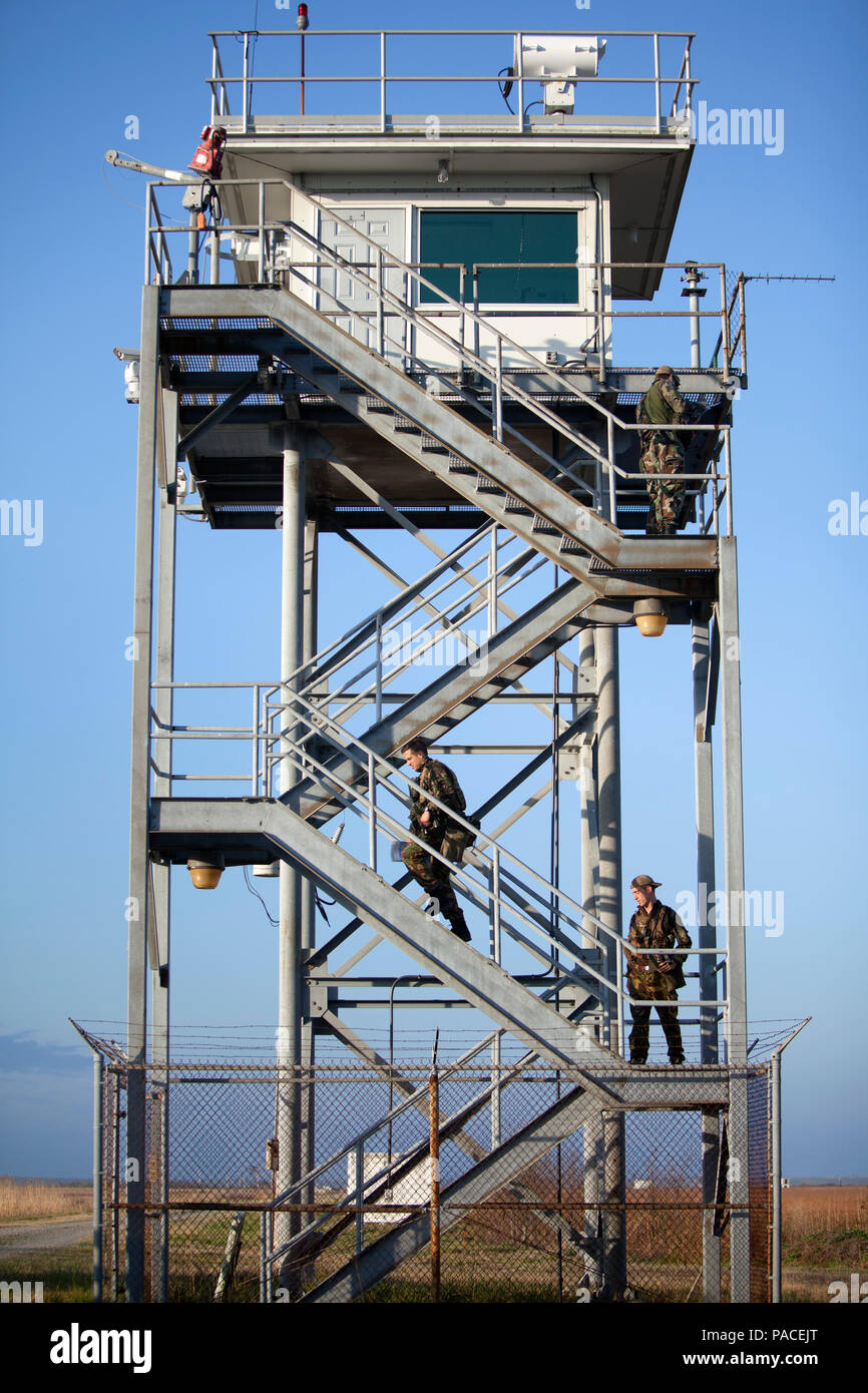 Dutch Marines climb an observation tower during Joint Terminal Air ...