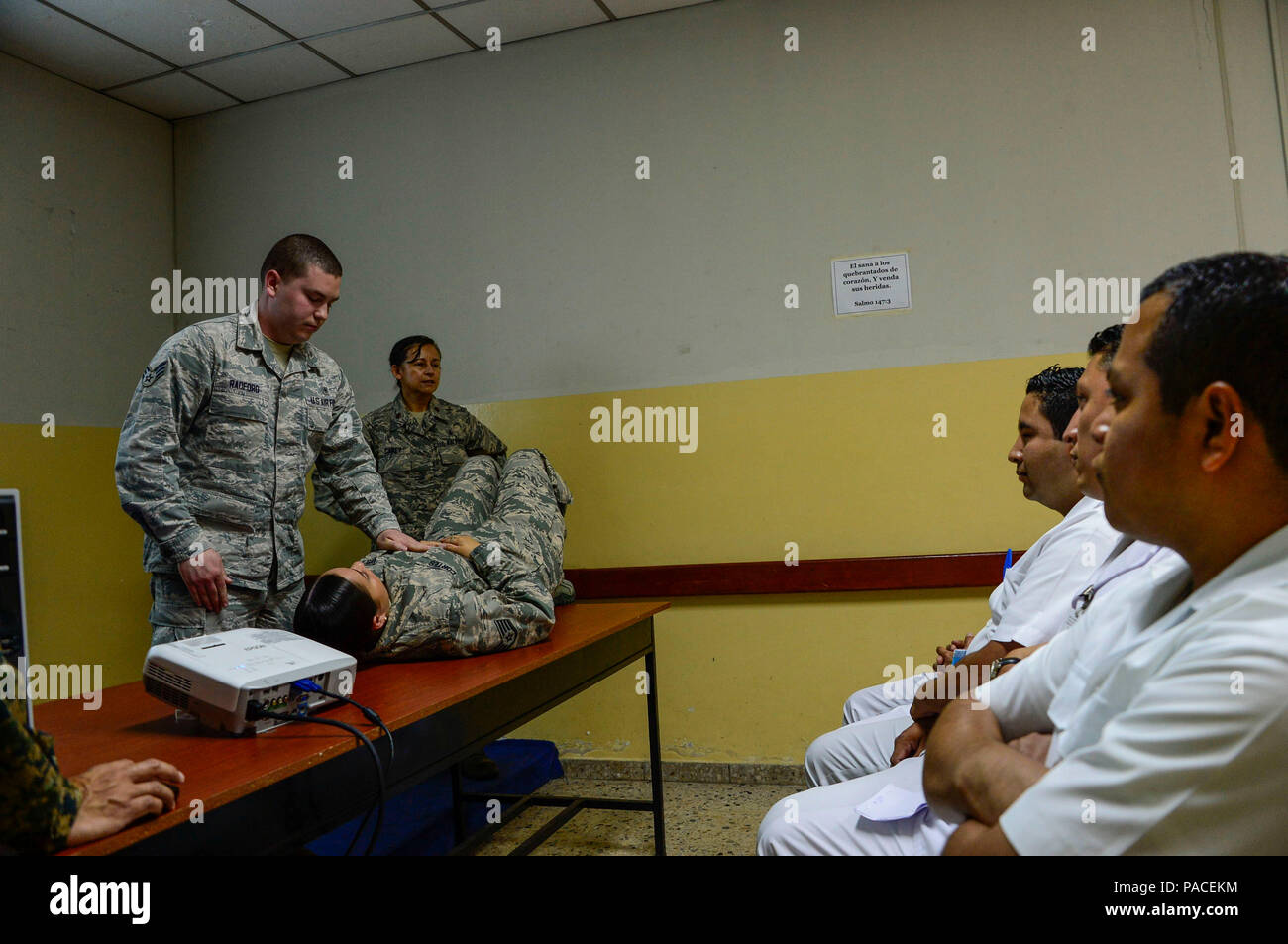 U.S. Air Force Senior Airman Jacob Radford and Staff Sgt. Karina Cortes ...