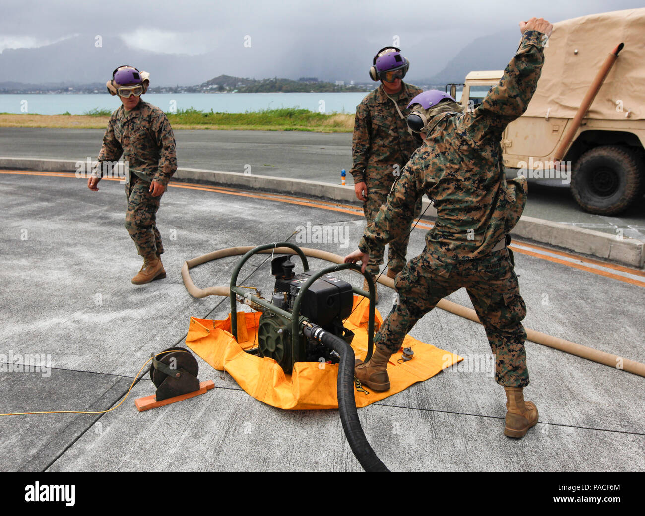 U.S. Marines with Marine Wing Support Detachment 24 start a pump to ...