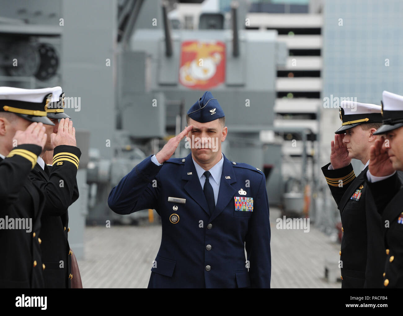 NORFOLK (March 11, 2016) - U.S. Air Force Col. Jeff Reiman salutes the ...