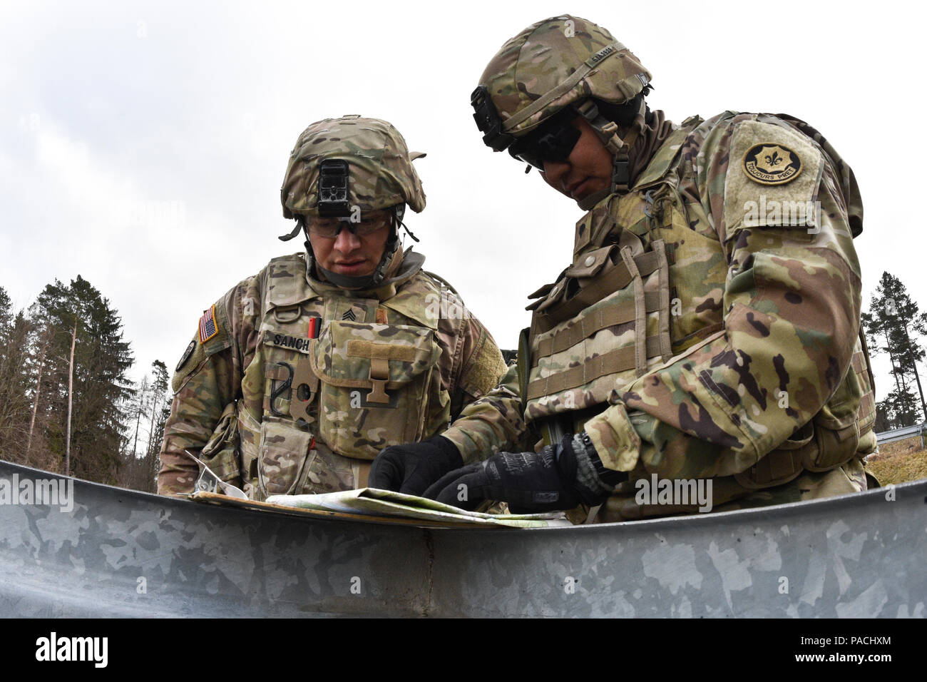 Staff Sgt. Adrian Sanchez (left) and Spc. Jerry Antonio (right,) both ...