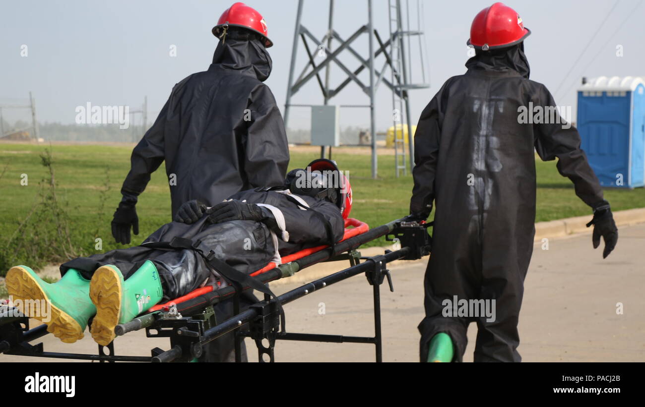 U.S. Soldiers assigned to the 21st Chemical Company, respond to a ...