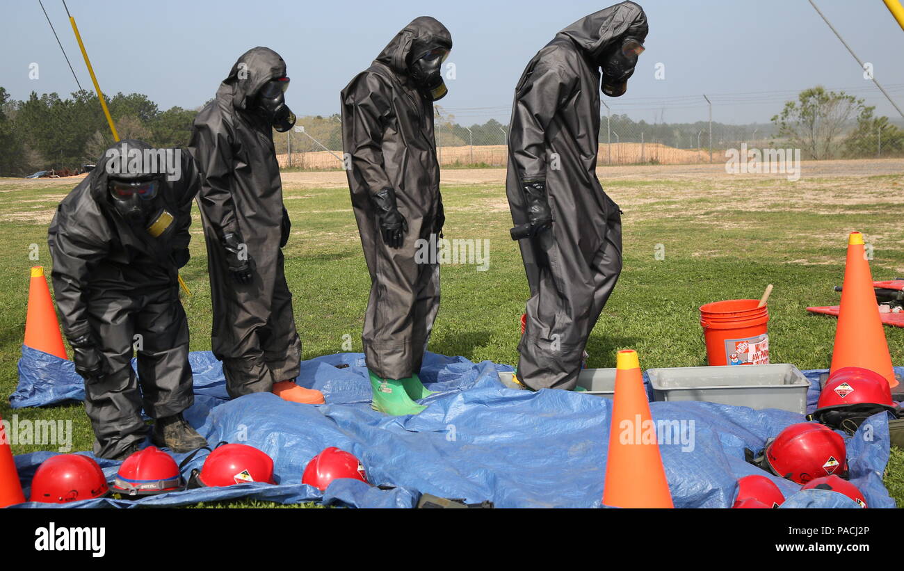 U.S. Soldiers assigned to the 21st Chemical Company, perform self ...