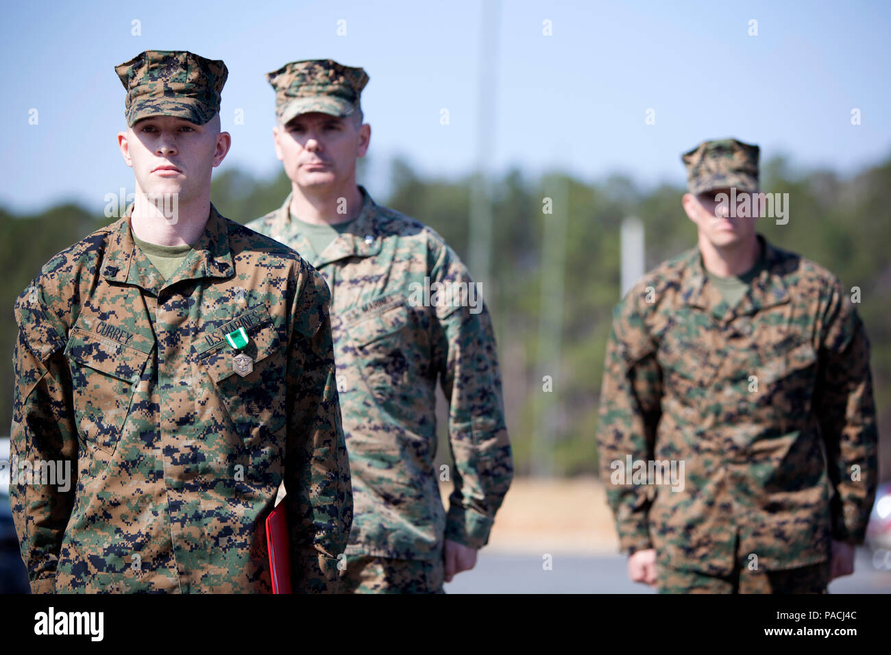 Cpl. Joseph Currey, left, stands in front of Lt. Col. Jeremy Winters ...