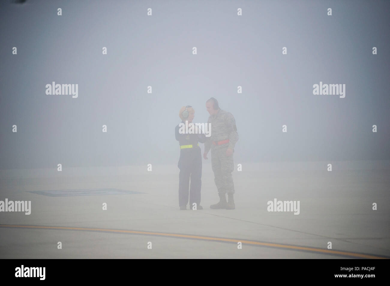 Tech. Sgt. Christine King (left), 512th Airlift Wing, explains to ...