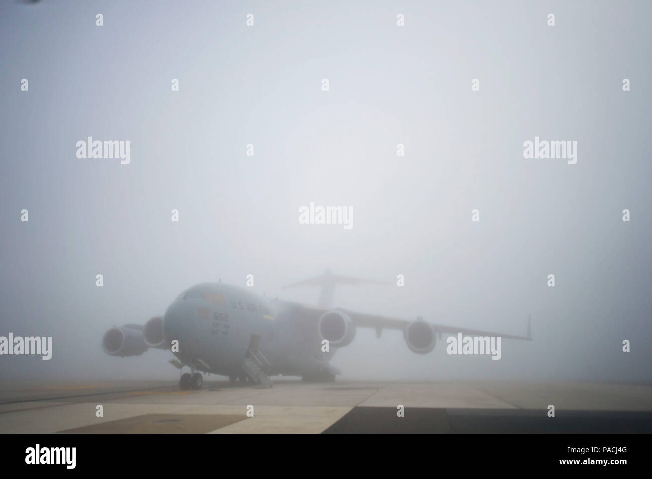 Tech. Sgt. Christine King (left), 512th Airlift Wing, explains to ...