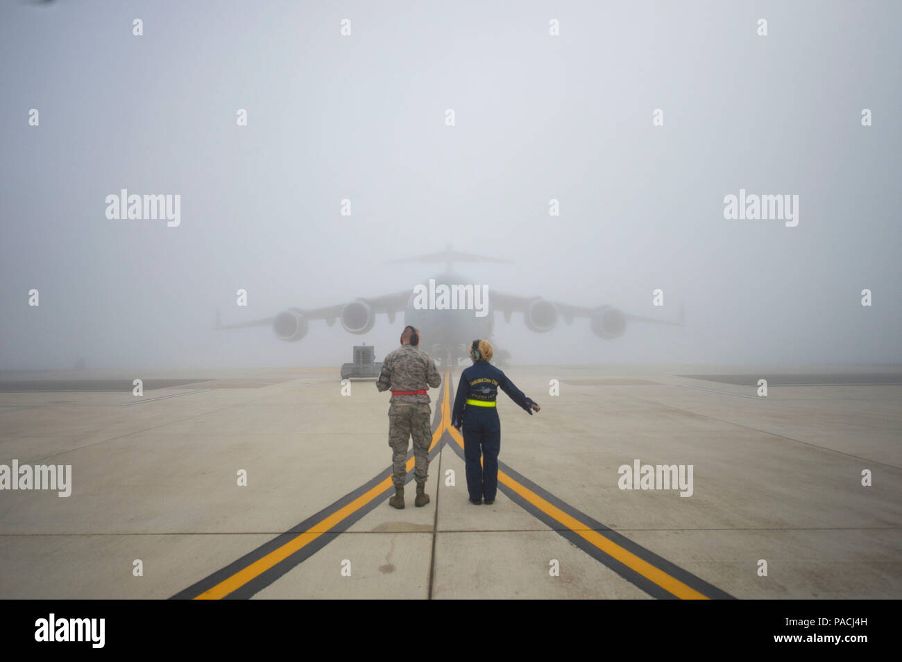 Tech. Sgt. Christine King (right), 512th Airlift Wing, shows Airman 1st ...