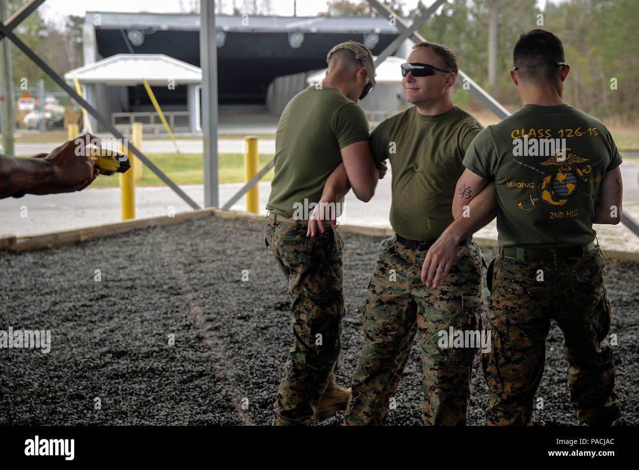 A Marine with Combat Logistics Battalion 2 is hit with two prongs from ...