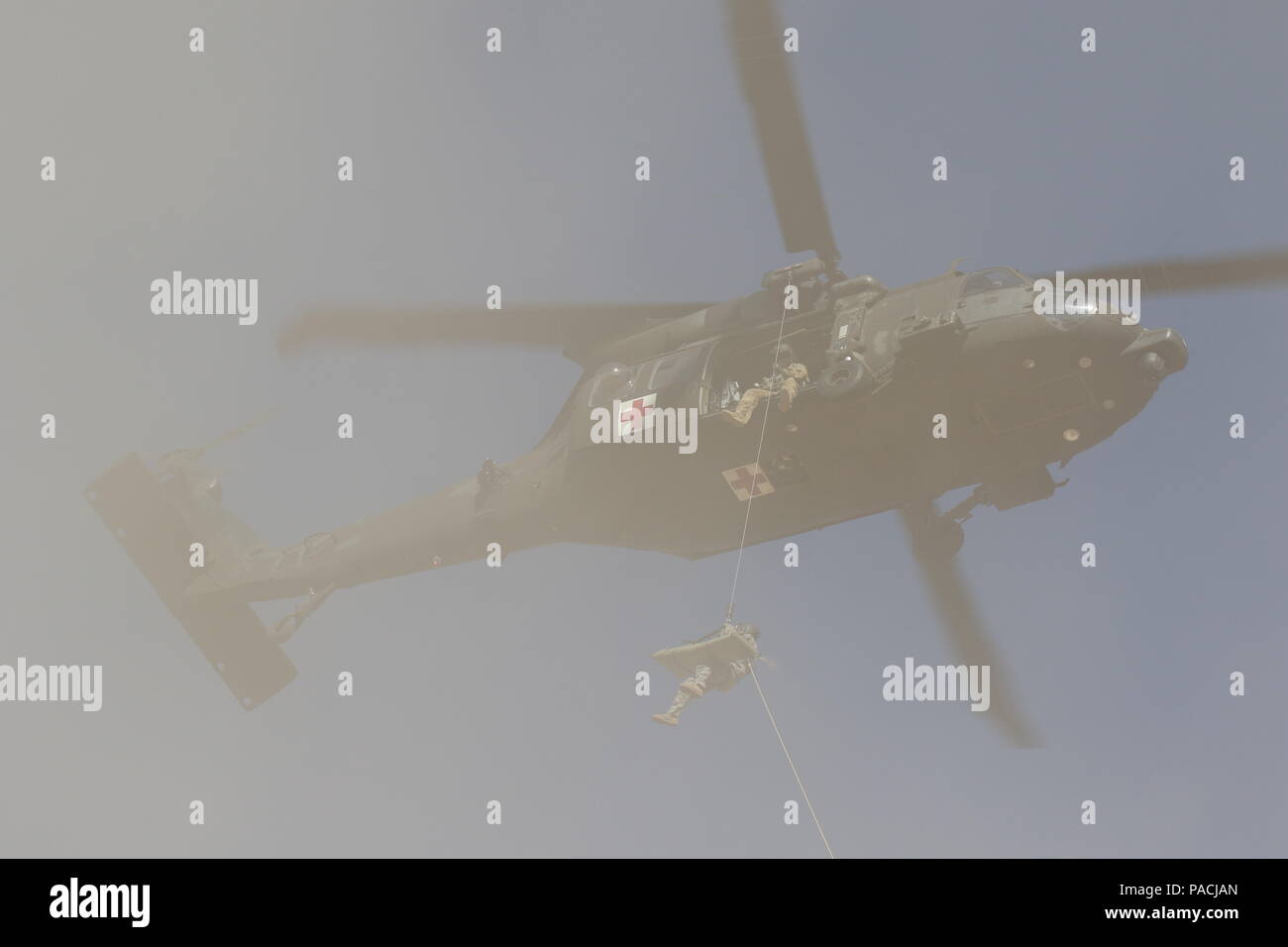 Nearing the top, a flight medic from 3rd General Support Aviation ...