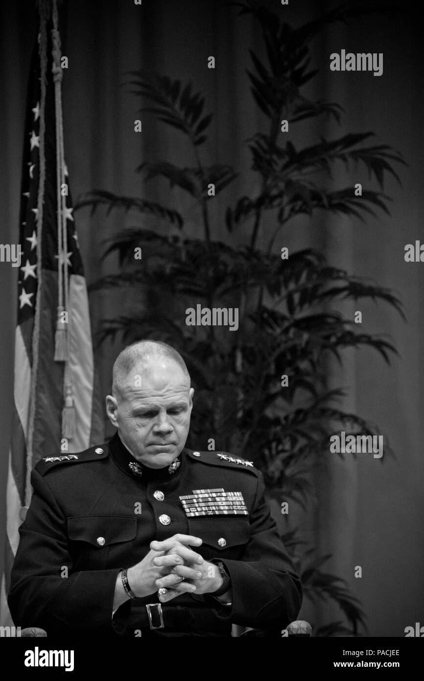 Commandant of the Marine Corps Gen. Robert B. Neller listens to a ...