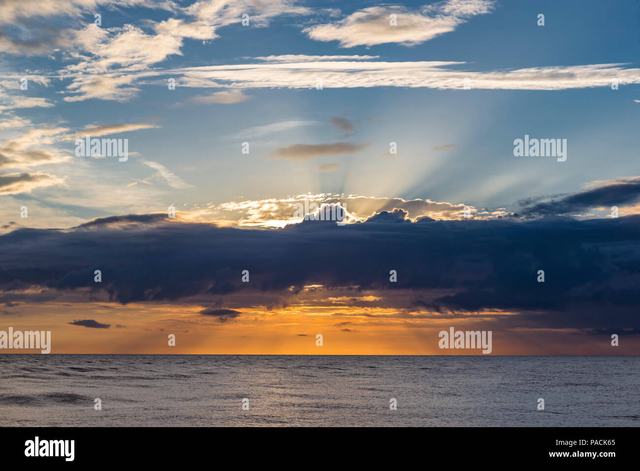 God rays in sunset over water in the Gulf of Mexico from Venice Florida ...