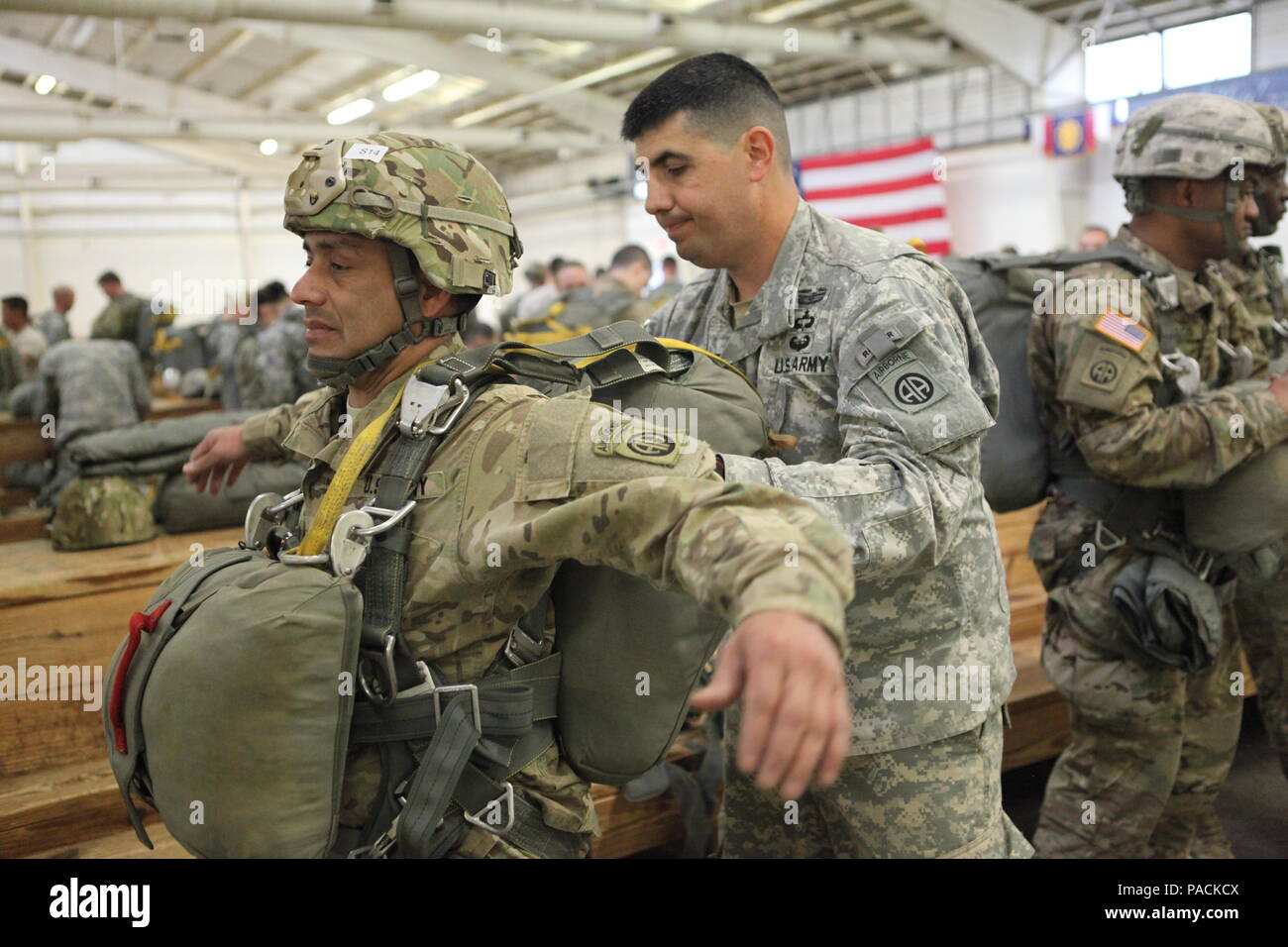 U.S. Army Command Sgt. Maj. Josue Pinos receives a Jumpmaster personnel ...