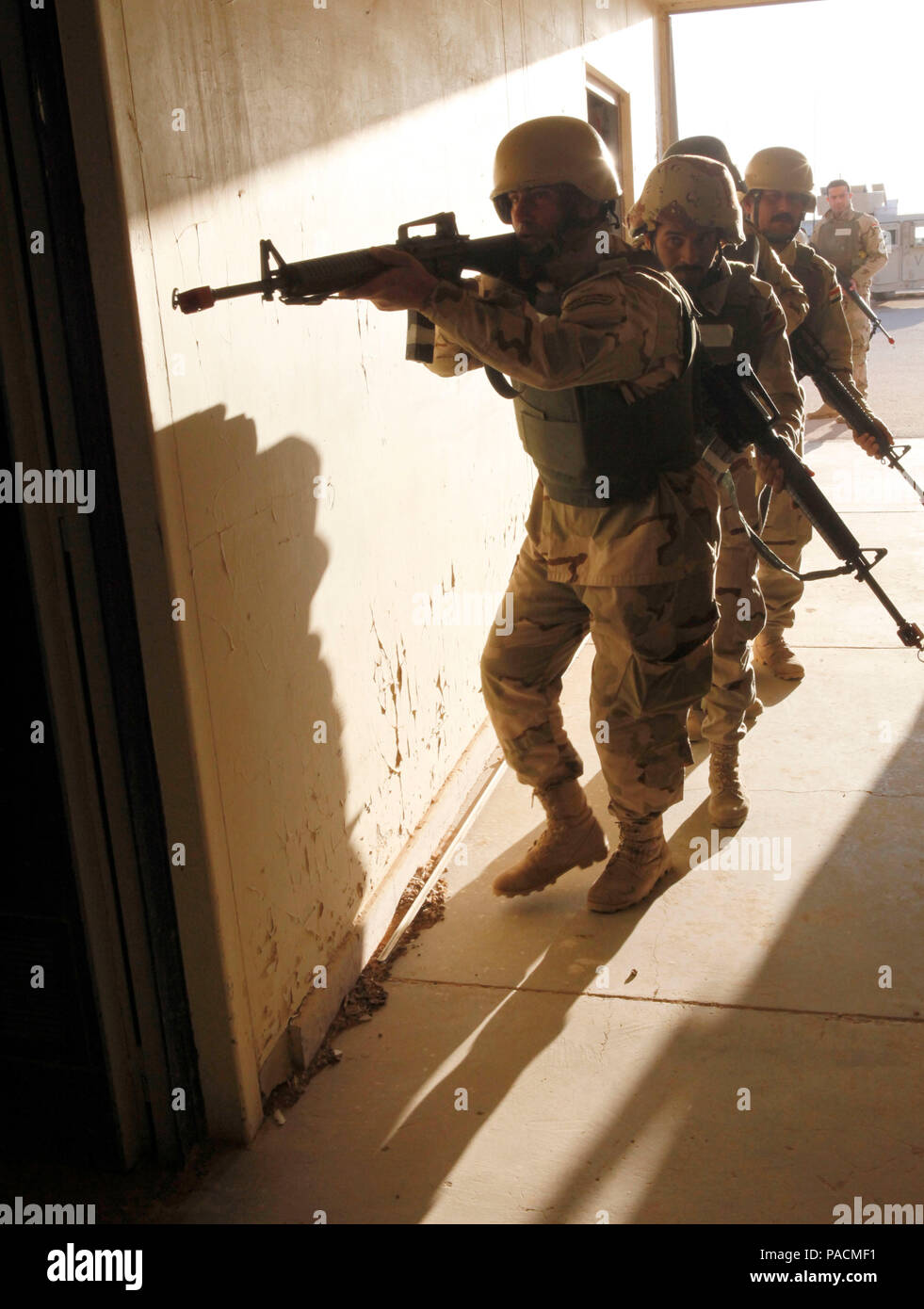 Iraqi soldiers from the 7th Iraqi Army Division conduct a forcible ...