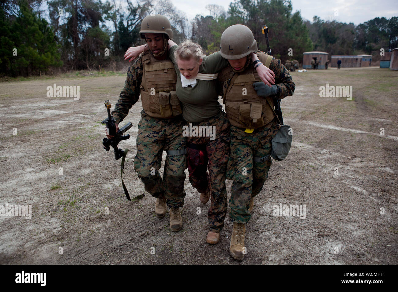U.S. Navy Corpsmen assigned to Field Medical Training Battalion East ...