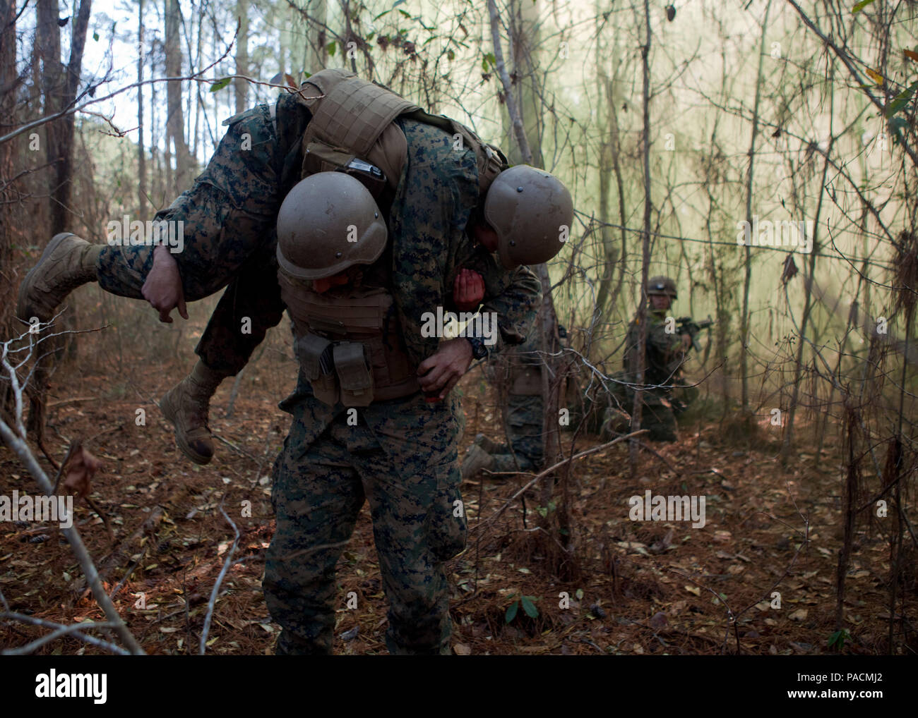 A U.S. Navy Corpsman assigned to Field Medical Training Battalion East ...