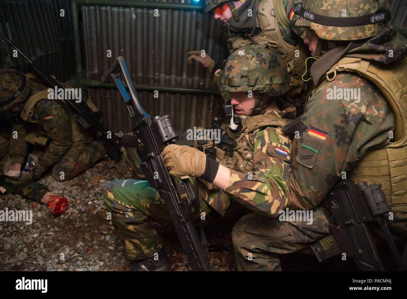 German medical soldiers respond to simulated IED casualties during ...