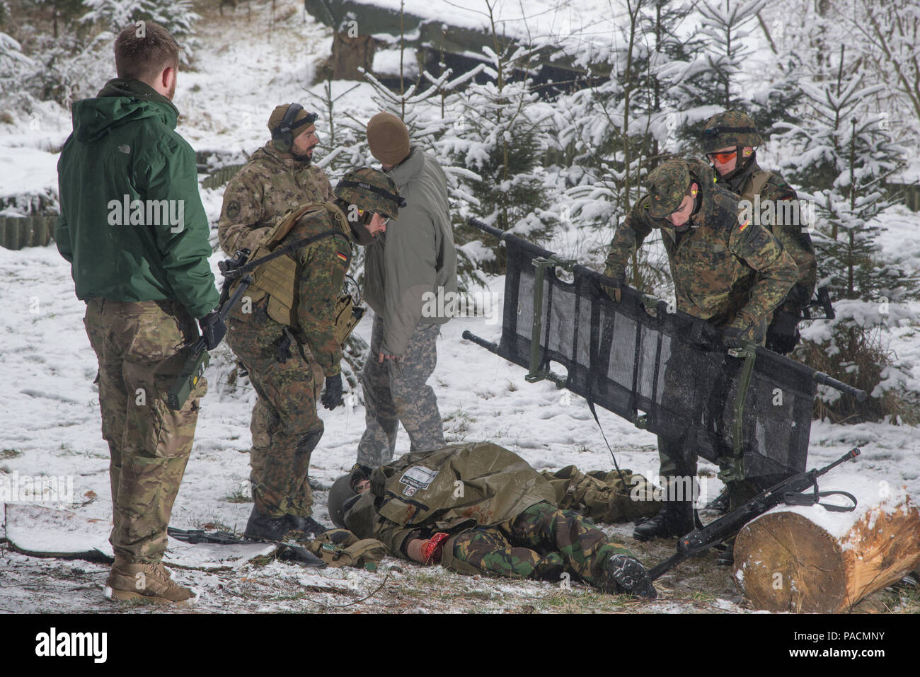 German medical soldiers prepare an international soldier, role player ...