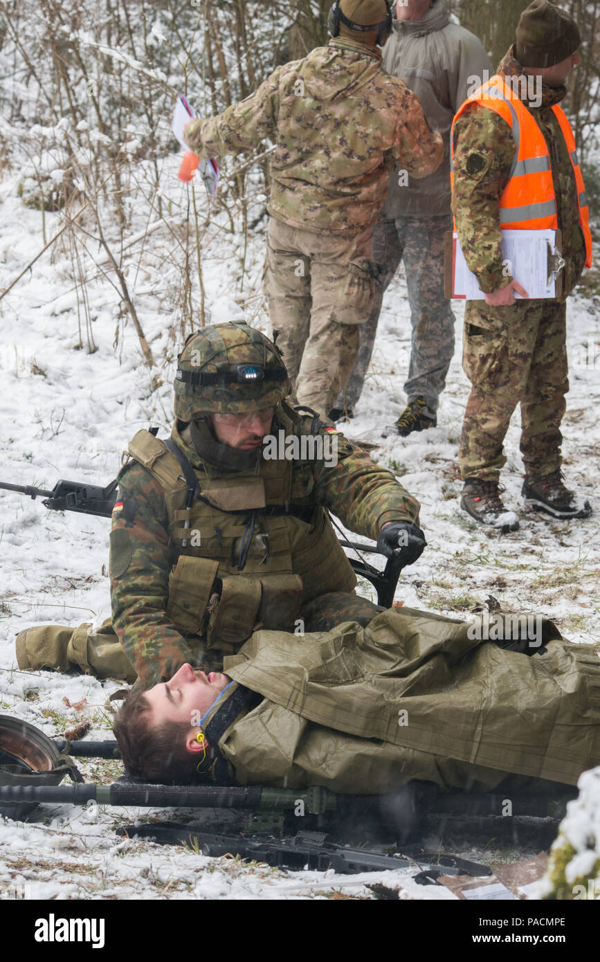 German medical soldiers prepare an international soldier, role player ...