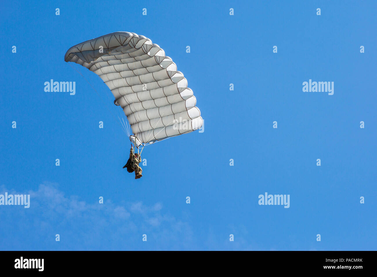 A U.S. Army paratrooper, assigned to the U.S. Army John F. Kennedy ...