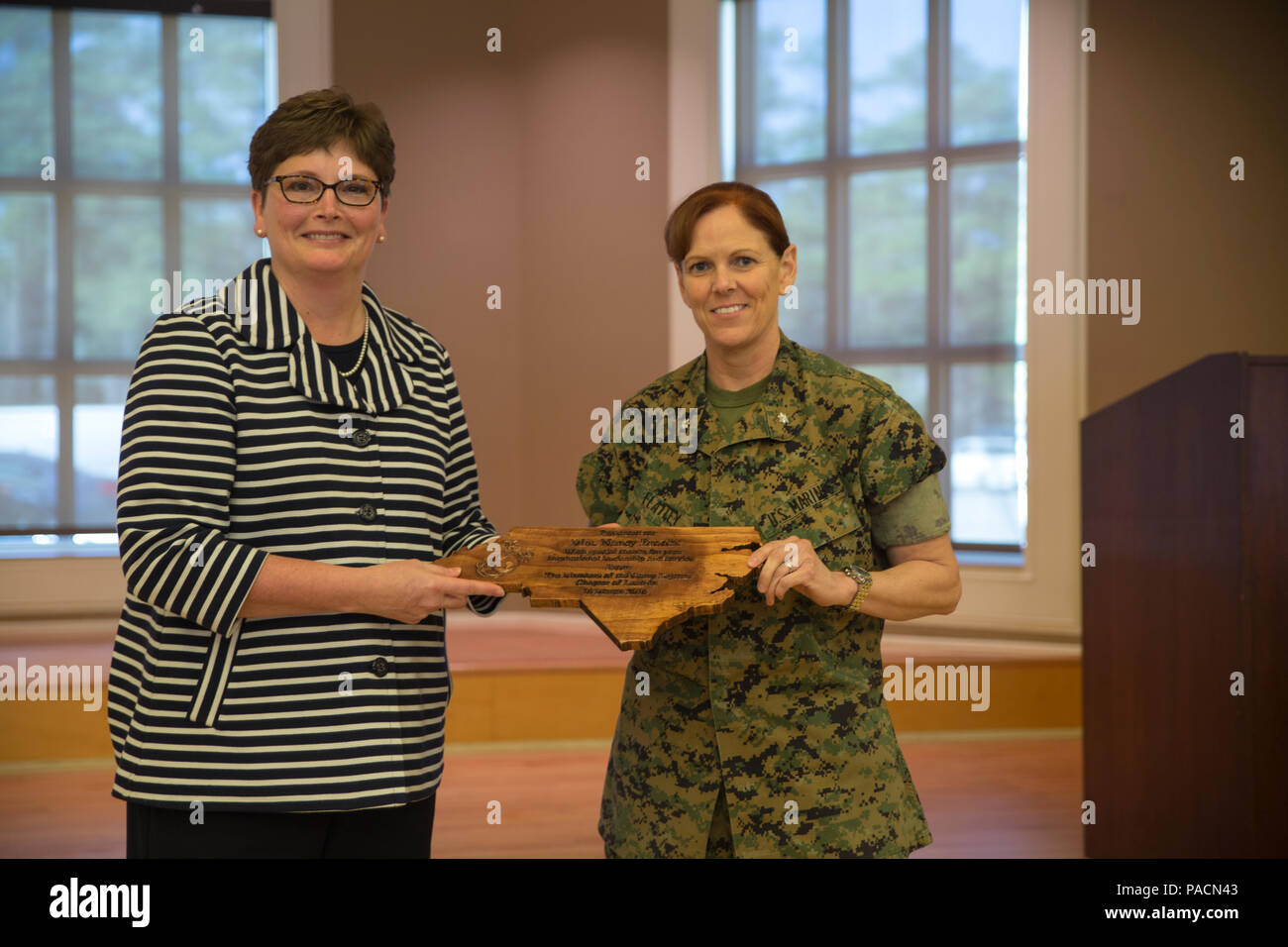 Nancy Brooks, vice president of procurement for Best Buy, receives a ...