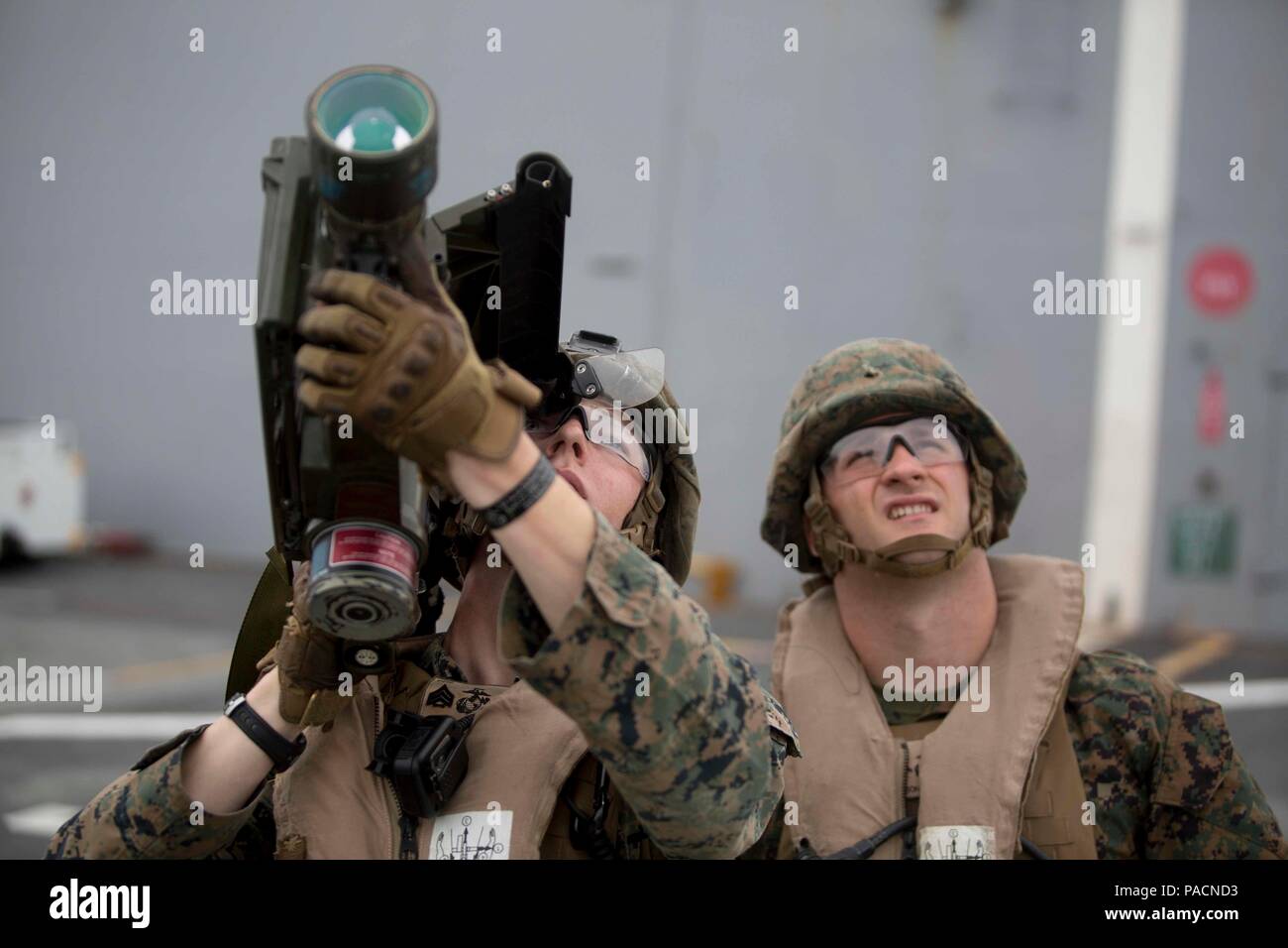 U.S. Marines Sgt. Ian Keyser and Cpl. Gregory Johnson, low-altitude air ...