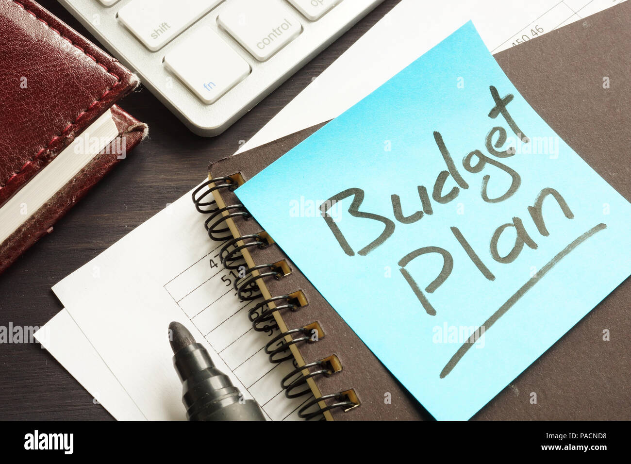 Budget Plan. Documents keyboard and note Stock Photo - Alamy