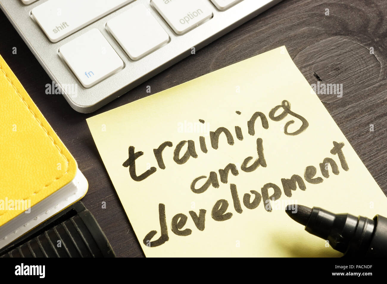 Training and development handwritten in a note Stock Photo - Alamy