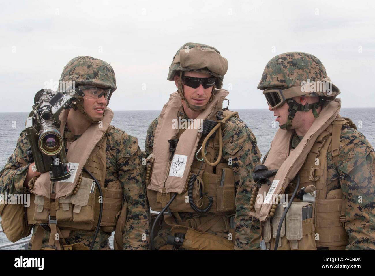 U.S. Marines (from left) Lance Cpl. Enrique Delavega, Cpl. Dakota ...