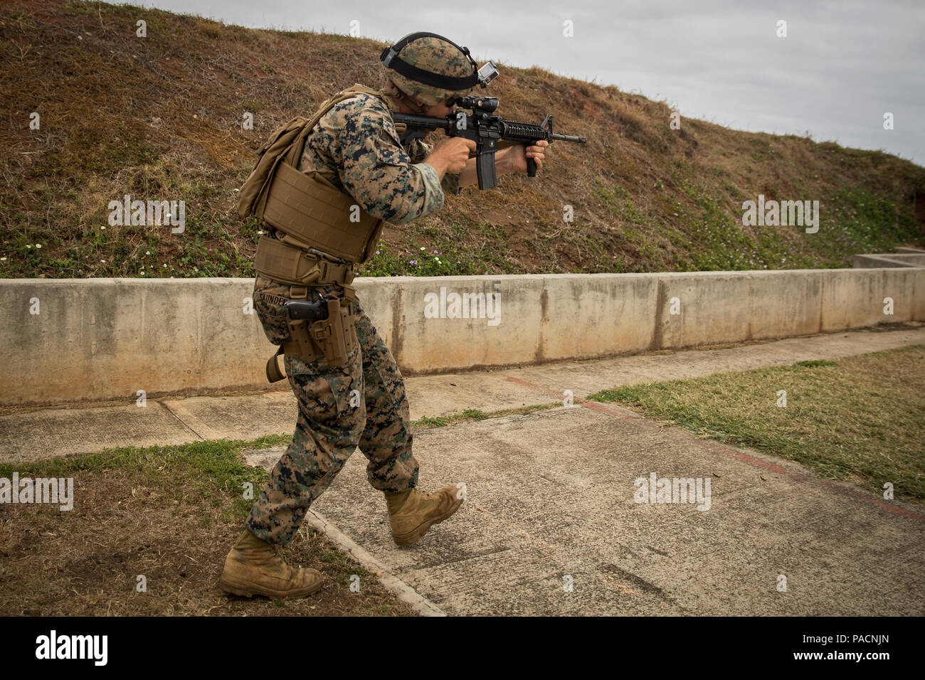 Cpl. Bradley Saunders engages targets down range during a course of ...