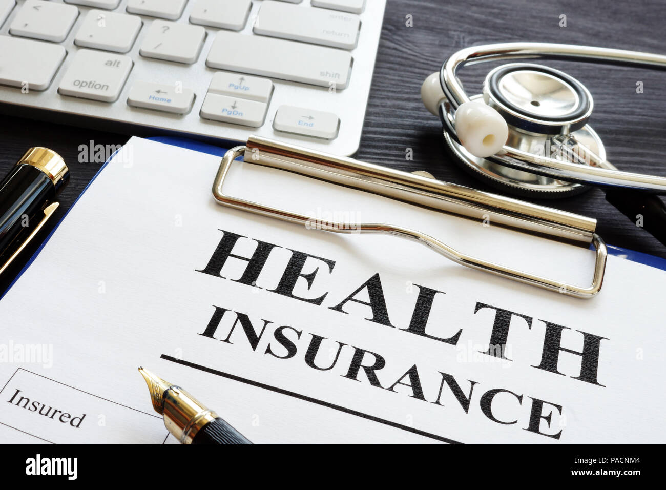 Individual health insurance policy and stethoscope Stock Photo - Alamy