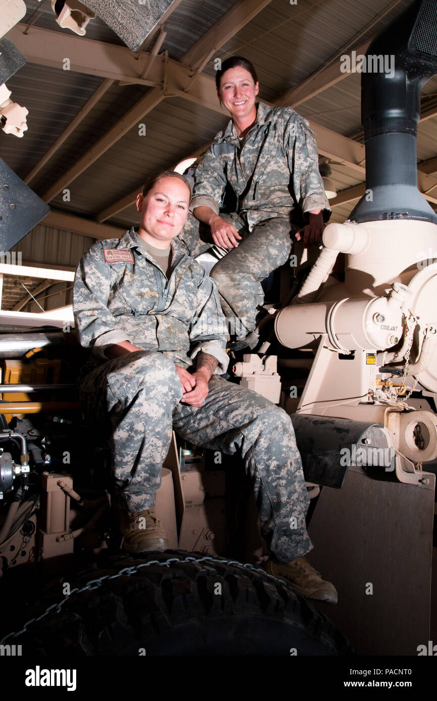 Sgt. Lea Delgado, a Tacoma, Wash., and resident, Spc. Kristie Bell, a ...