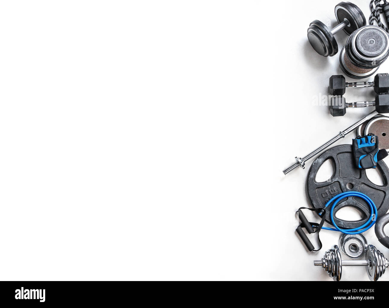 Sports equipment on a white background. Top view. Motivation. Copy ...
