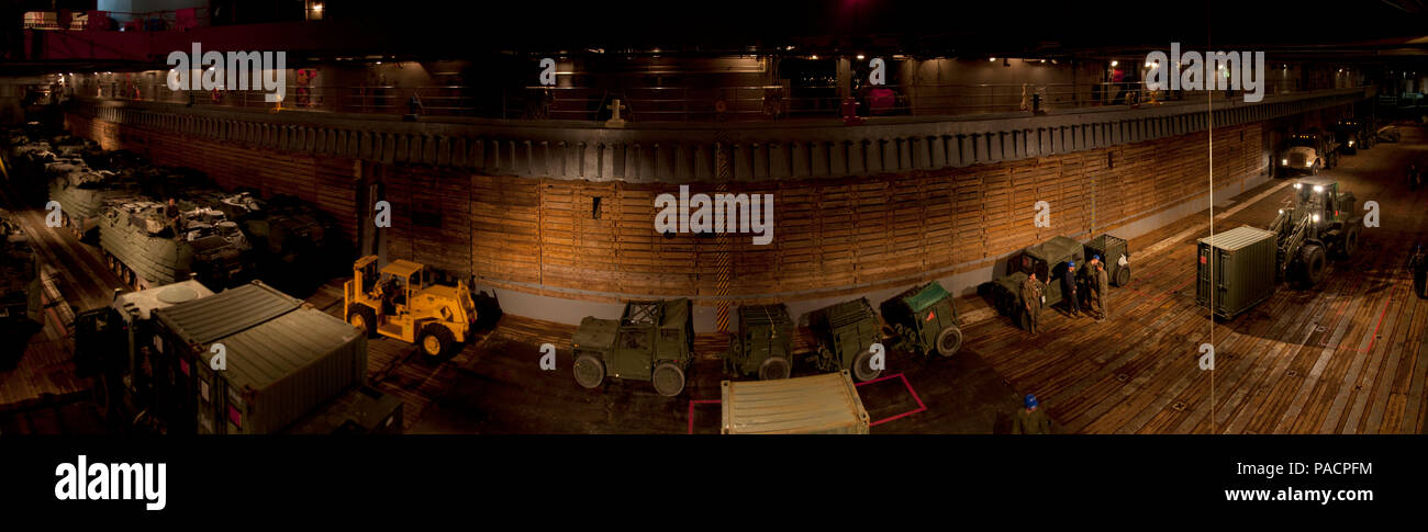 U.S. Marines with 22nd Marine Expeditionary Unit (MEU) load and arrange ...