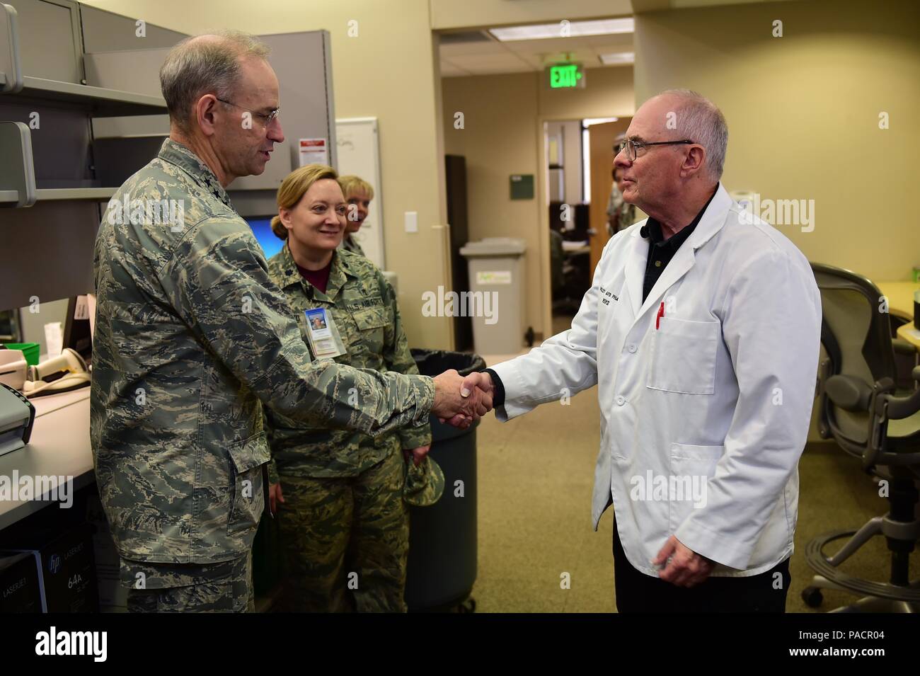 Lt. Gen. (Dr.) Mark A. Ediger, Surgeon General of the Air Force, coins ...