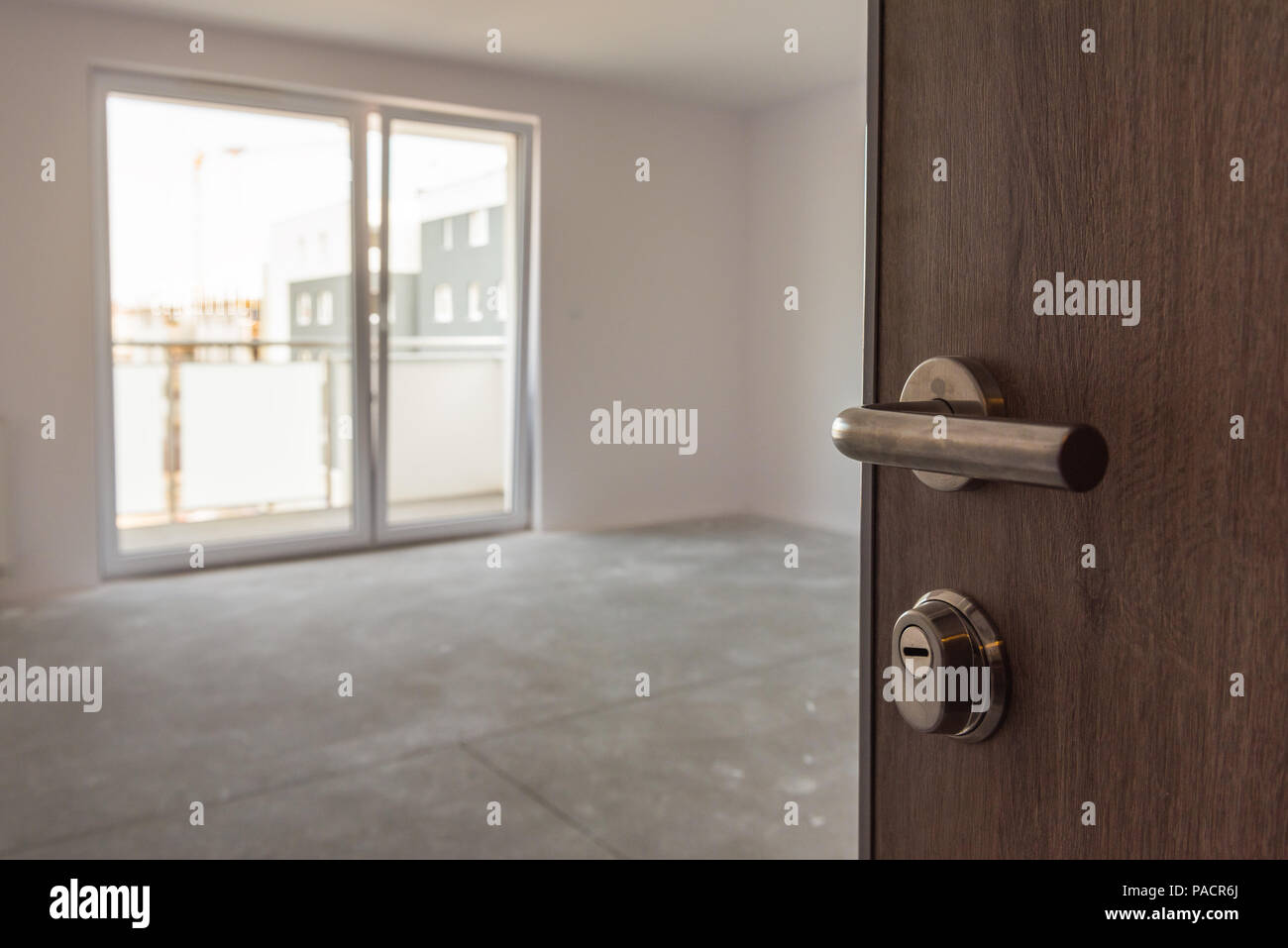 Half-open the door, living room under construction in the new european ...
