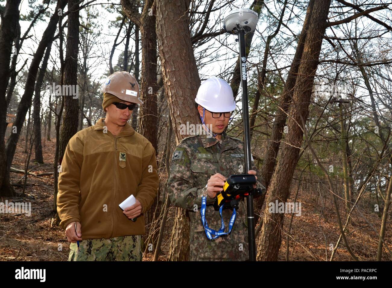 Engineering Aide 1st Class instructs a Republic of Korea Seabee in ...
