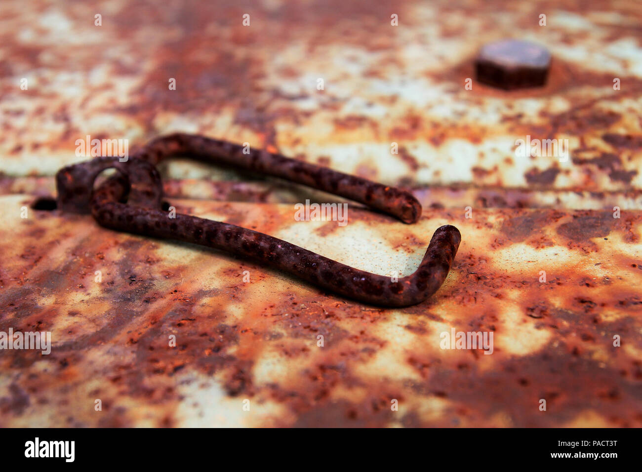 Old rusty piece of metal as part of mechanics Stock Photo - Alamy