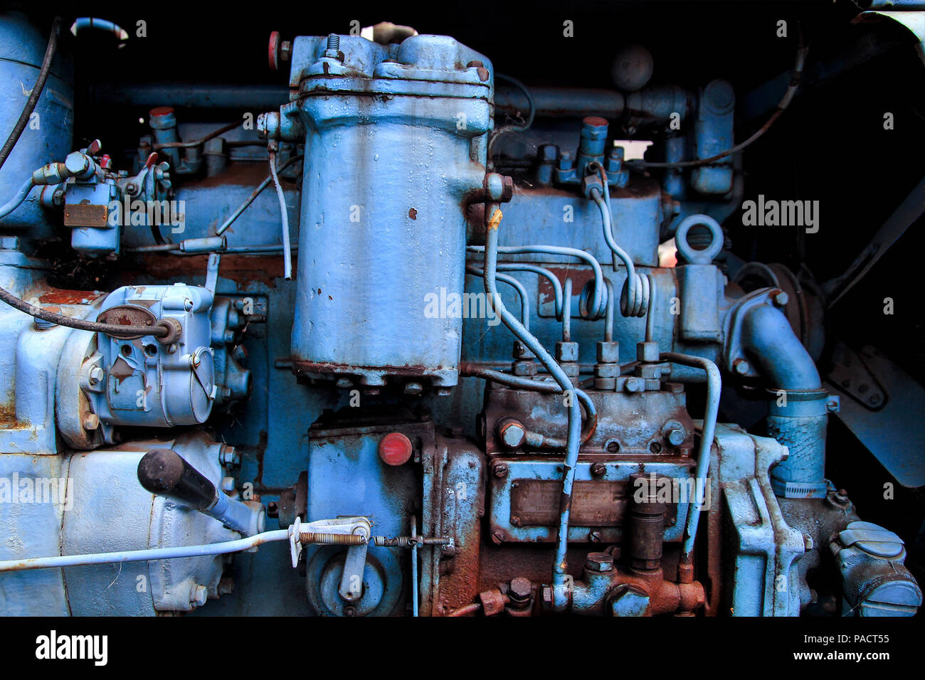 Old tractor engine with many modifications. Rusty, but working. Old ...