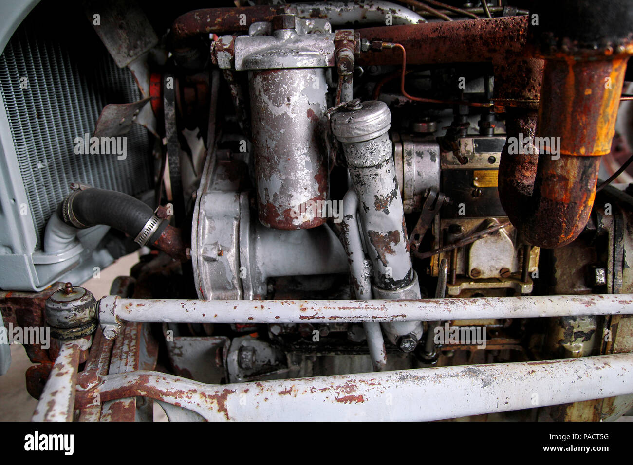 Old tractor engine with many modifications. Rusty, but working. Old ...