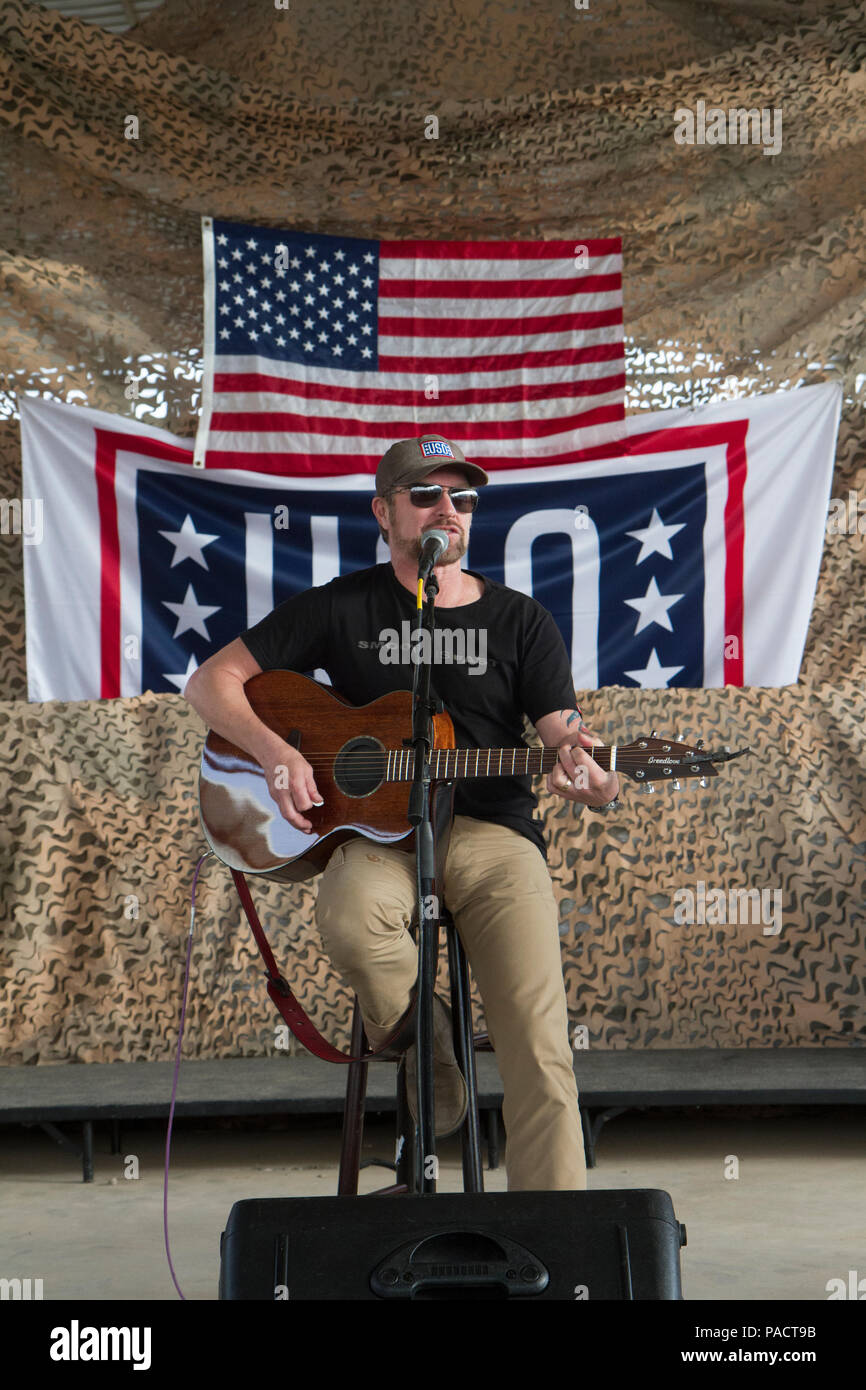 Country singer Craig Morgan performs for service members at the Baghdad ...