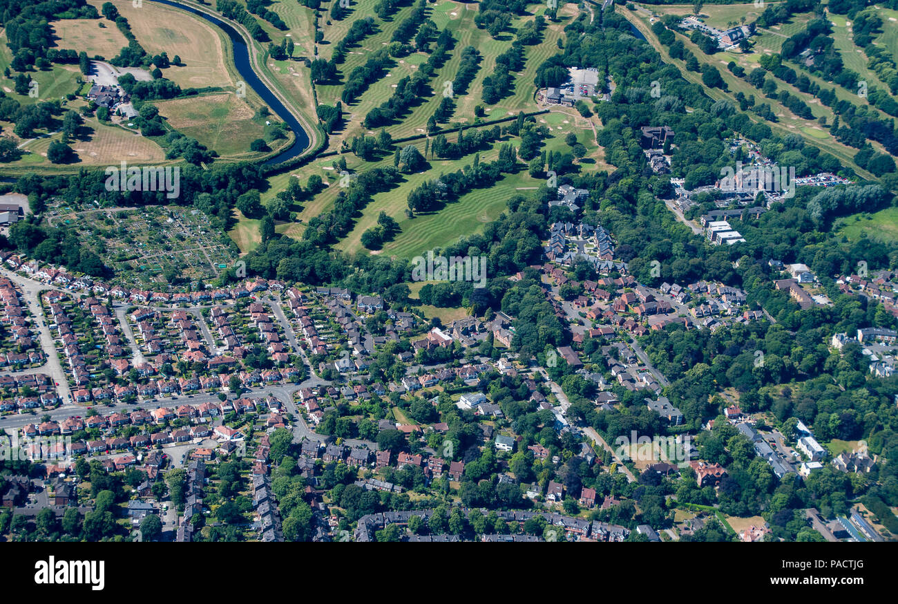 Aerial shot from a plane window of the English countryside showing town ...