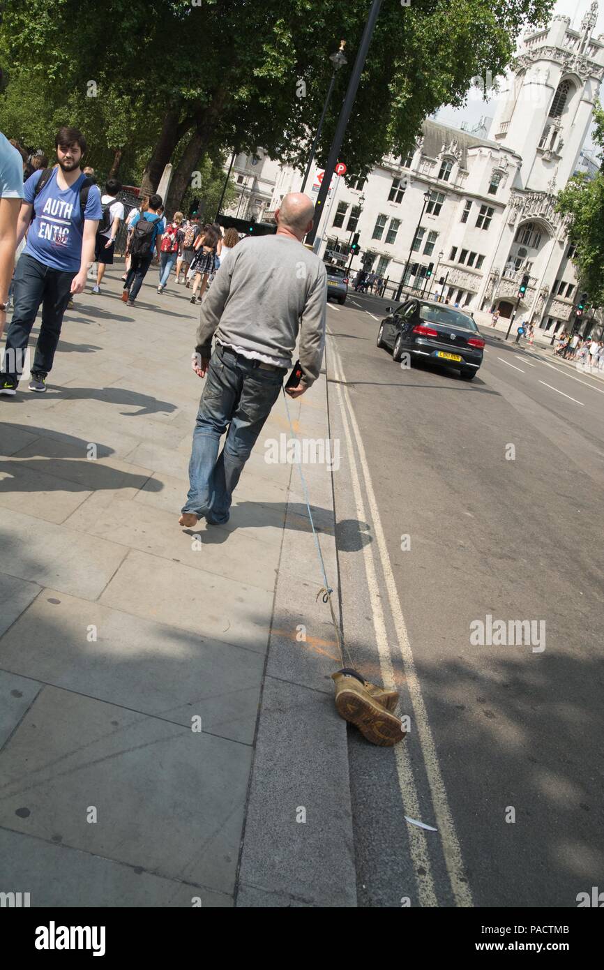 Tramp hobo shoes towing behind can hi-res stock photography and images ...