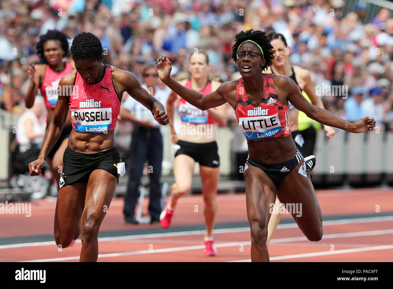 Olympic sprinter crossing finish line hi-res stock photography and ...