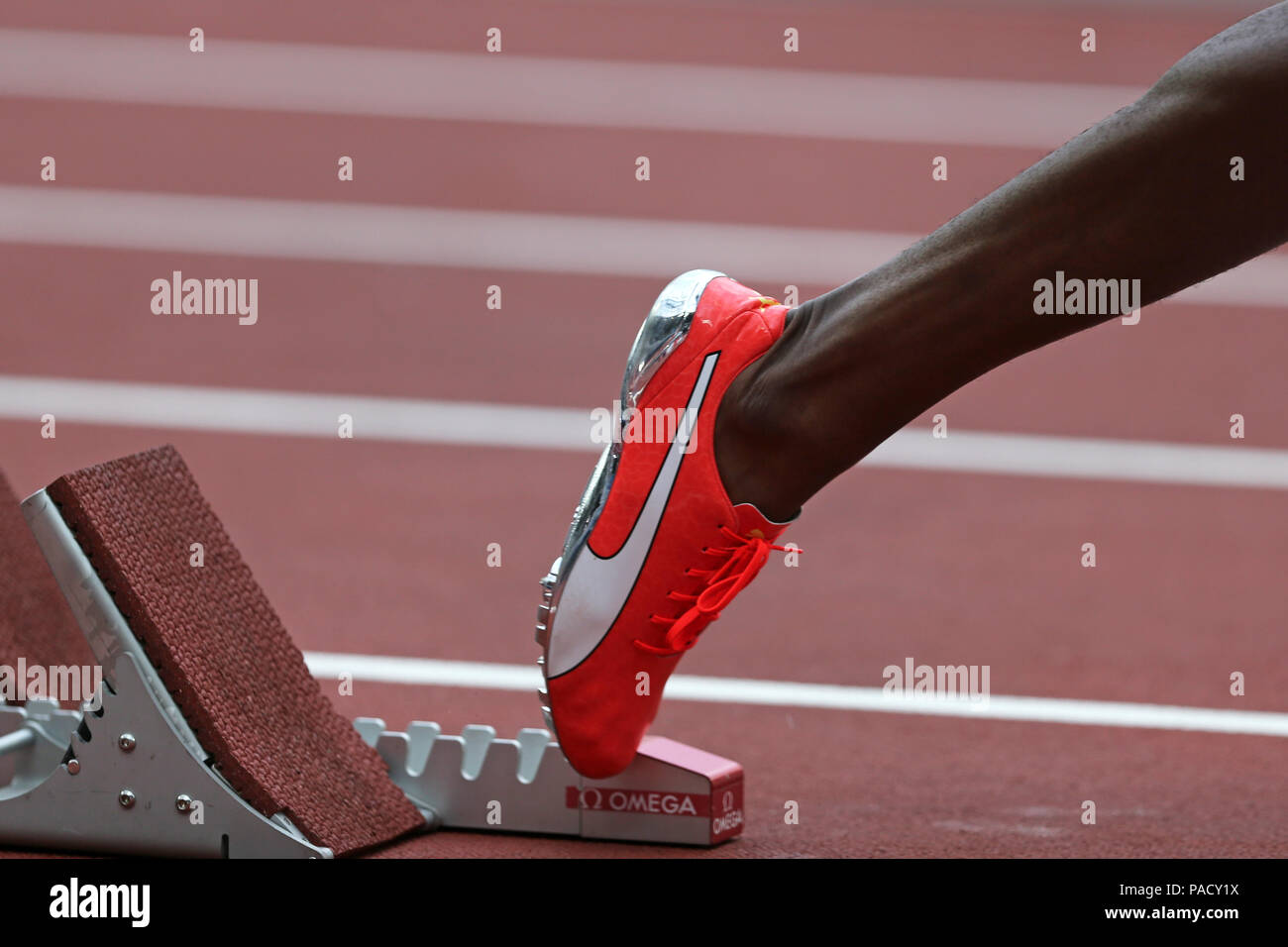 Male sprinter in blocks hi-res stock photography and images - Alamy