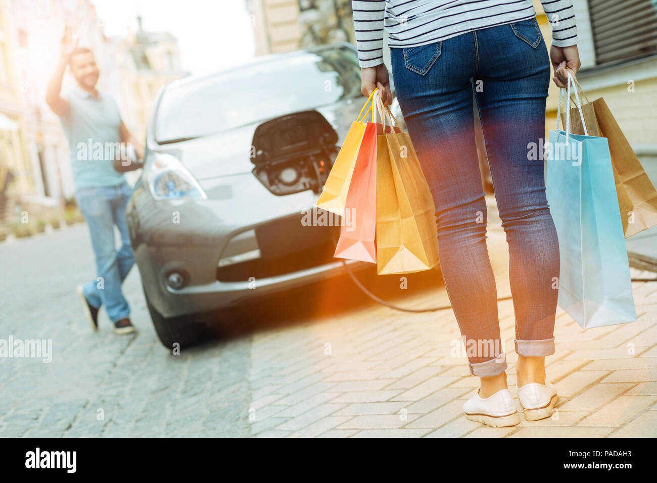 Young woman coming back from the shopping mall Stock Photo - Alamy