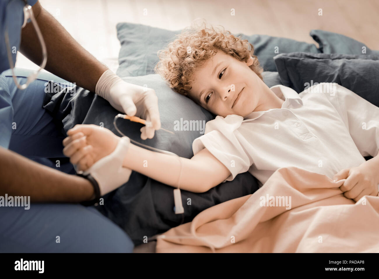 Smiling patient expressing positive while taking treatment Stock Photo ...