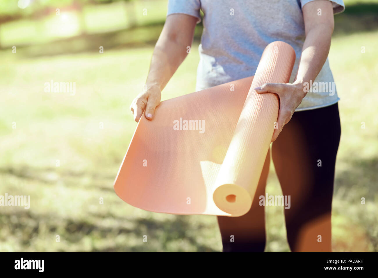 Orange yoga mat hi-res stock photography and images - Alamy